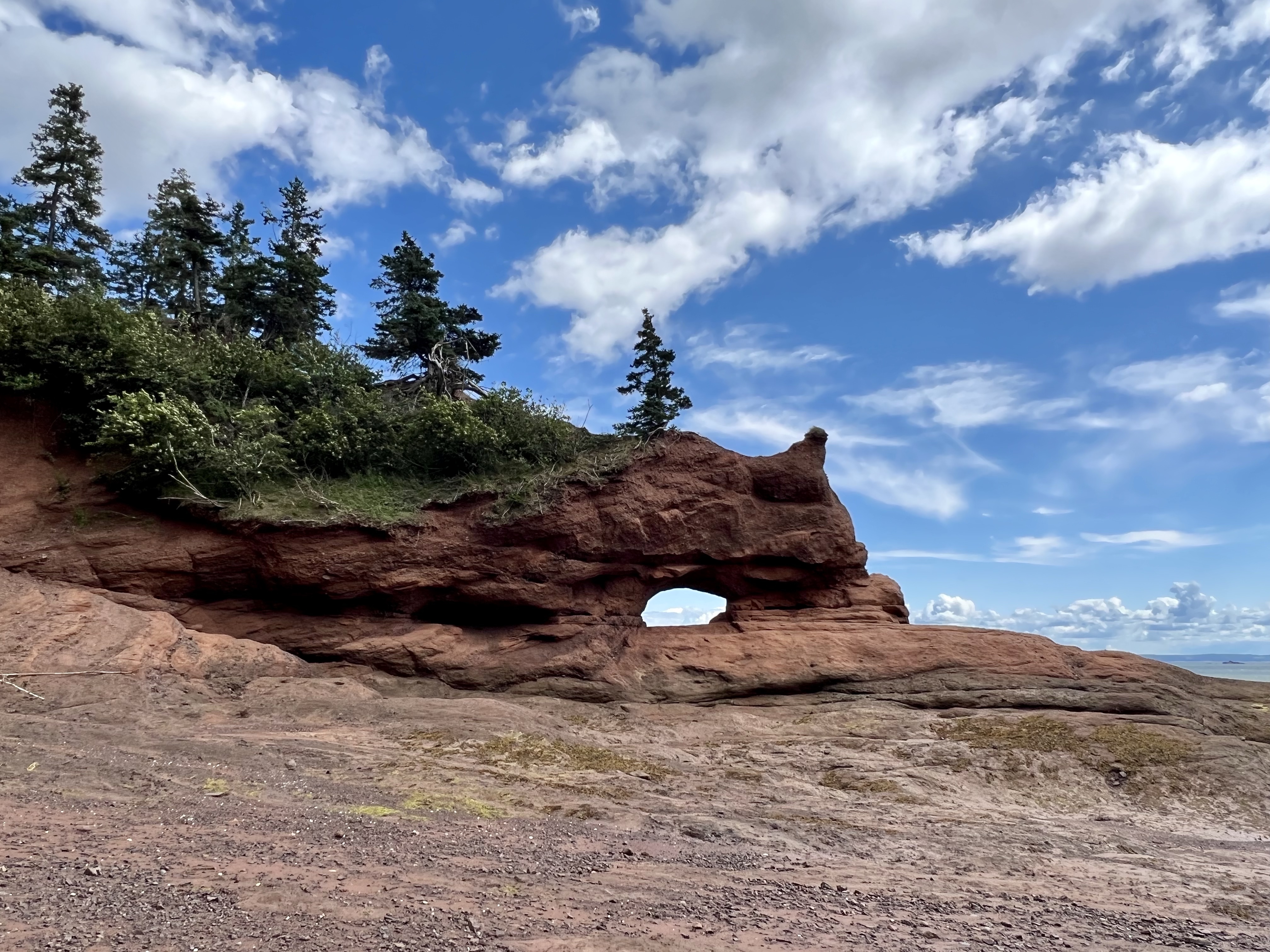 Soley Cove – Where Red Sandstone Cliffs Contrast with an Azure Sky ...
